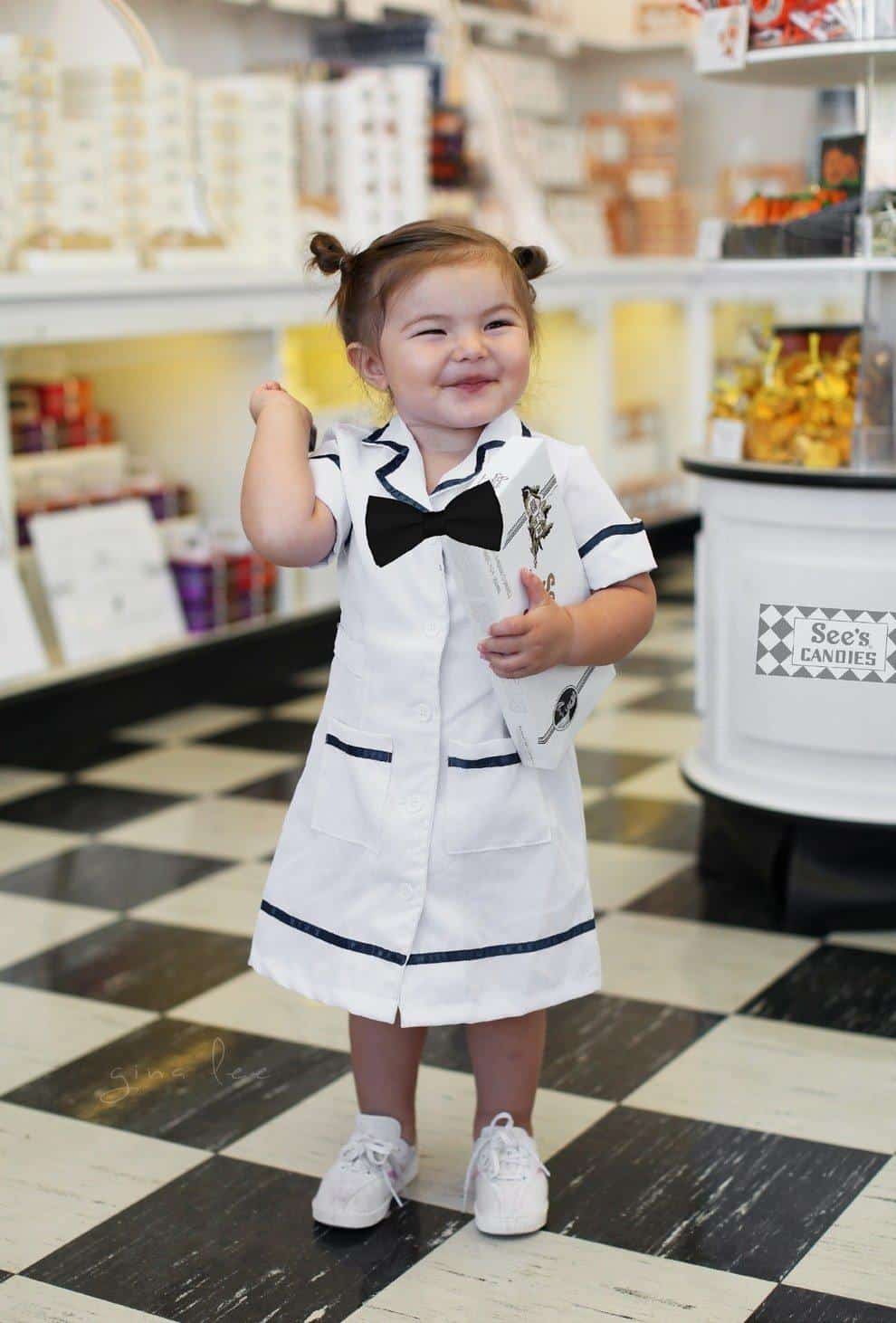 Two Cute Babies Counting Down To Halloween In Different Costumes
